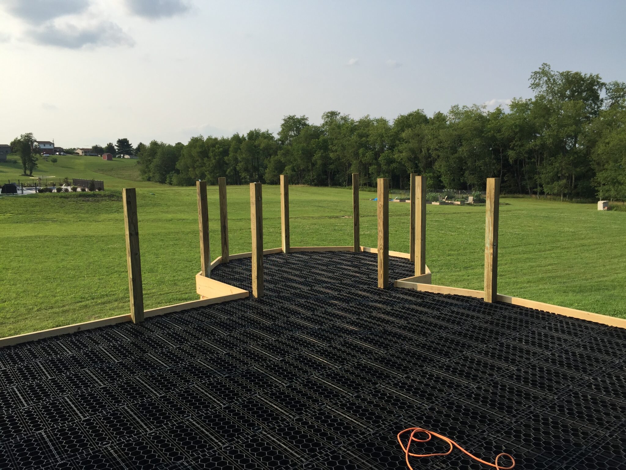 Elevated Concrete Paver Deck with Firepit - StoneDeks