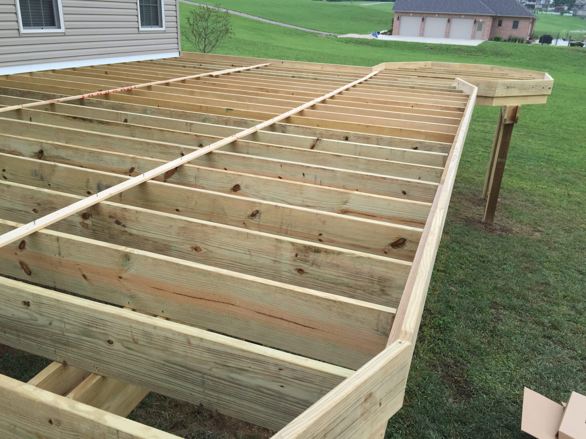 Elevated Concrete Paver Deck with Firepit - StoneDeks