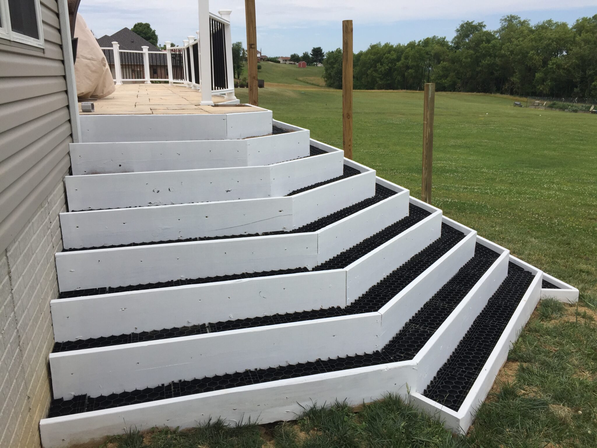 Elevated Concrete Paver Deck with Firepit - StoneDeks