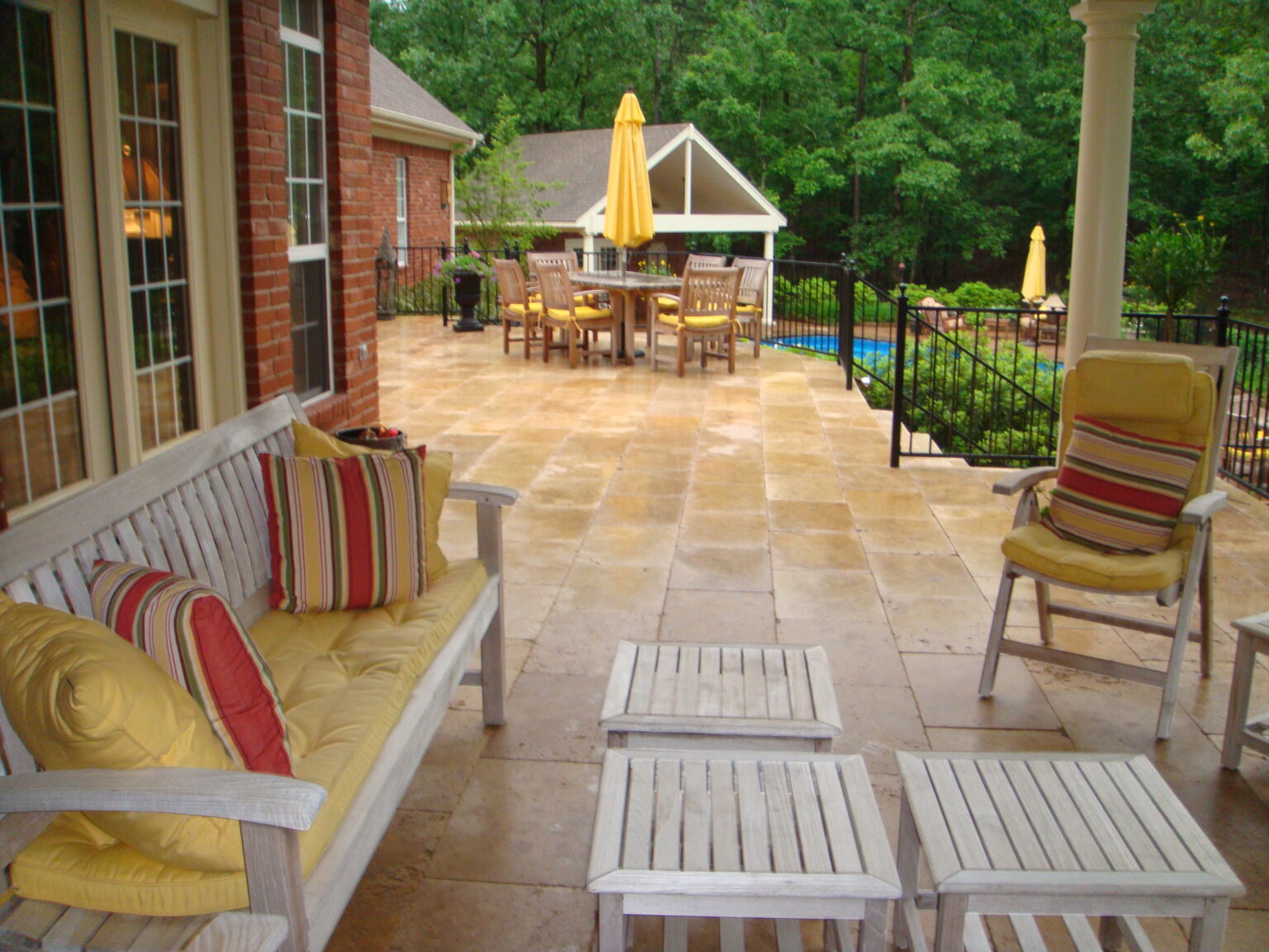 Resurfaced Deck with Travertine Pavers - StoneDeks