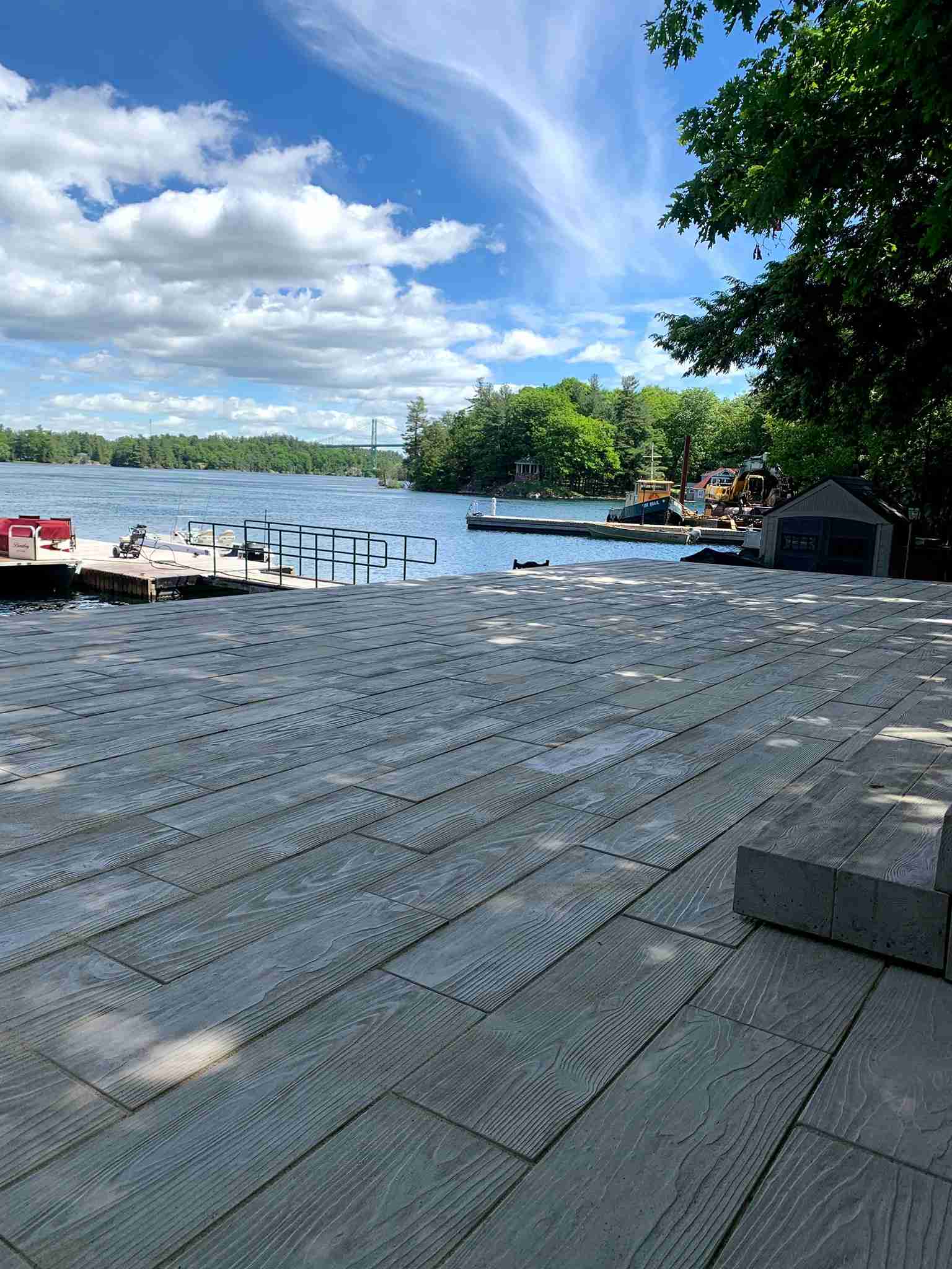 Lakeside Deck with Wood Grain Concrete Pavers - StoneDeks